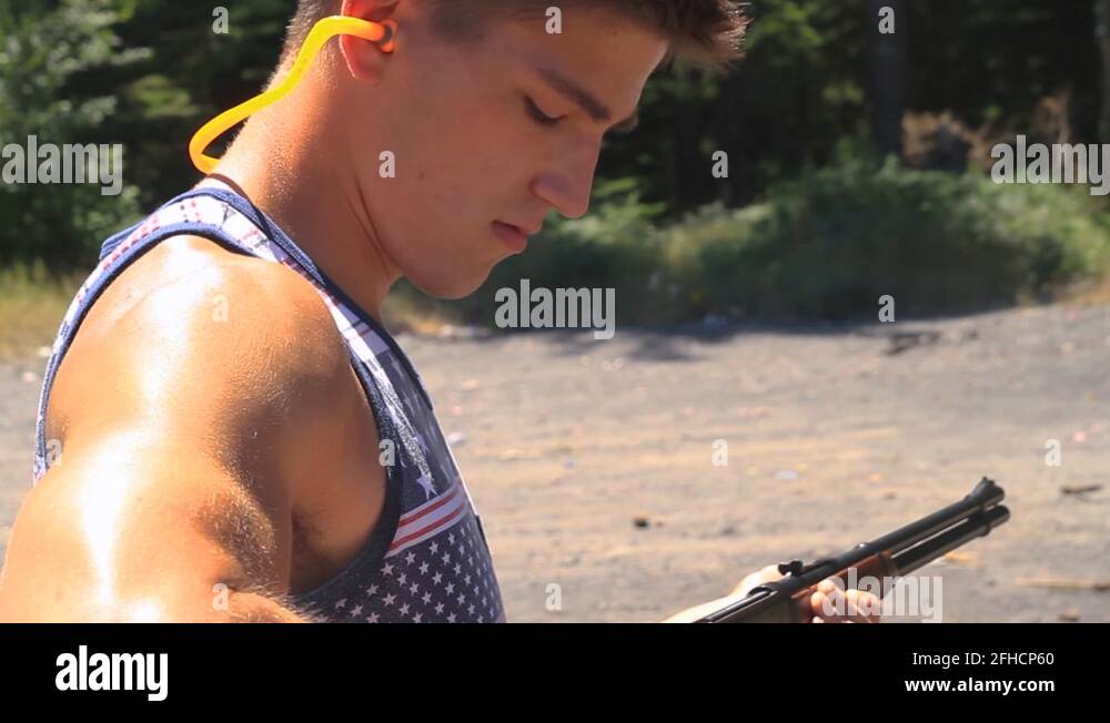 Muscular man gun Stock Videos & Footage - HD and 4K Video Clips - Alamy