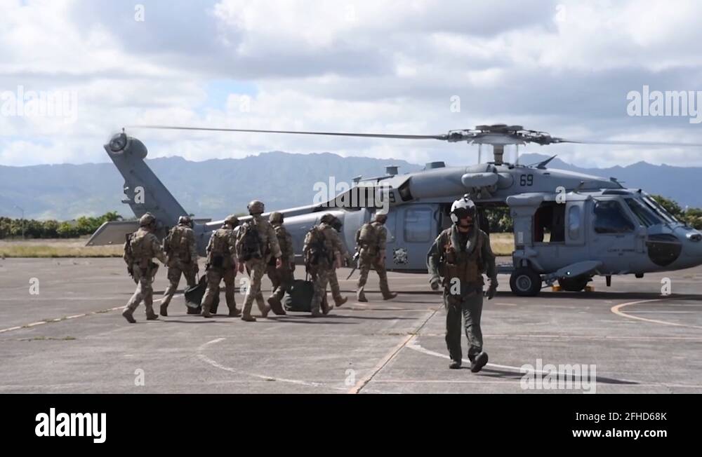 Coast Guard team aboard Sikorsky SH-60 Seahawk for fast roping exercise ...