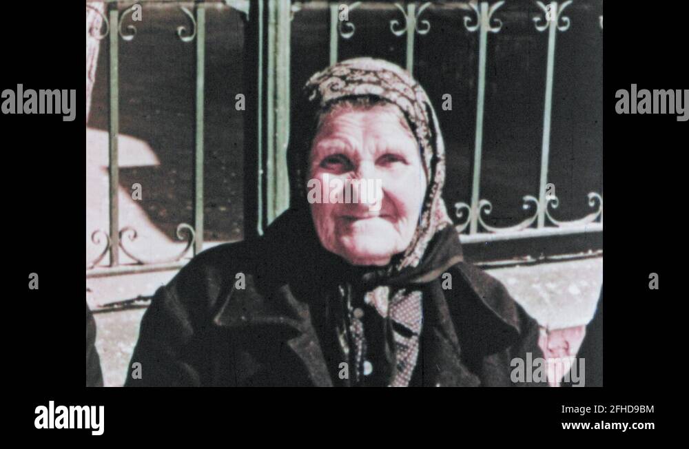 RUSSIA 1960s: lady in head scarf looks at camera. Map of Soviet Union ...