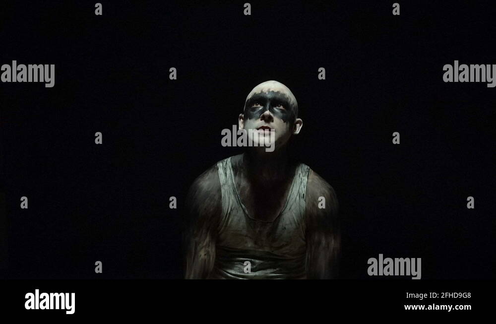 Crazy bald horror man in black room Stock Video Footage - Alamy