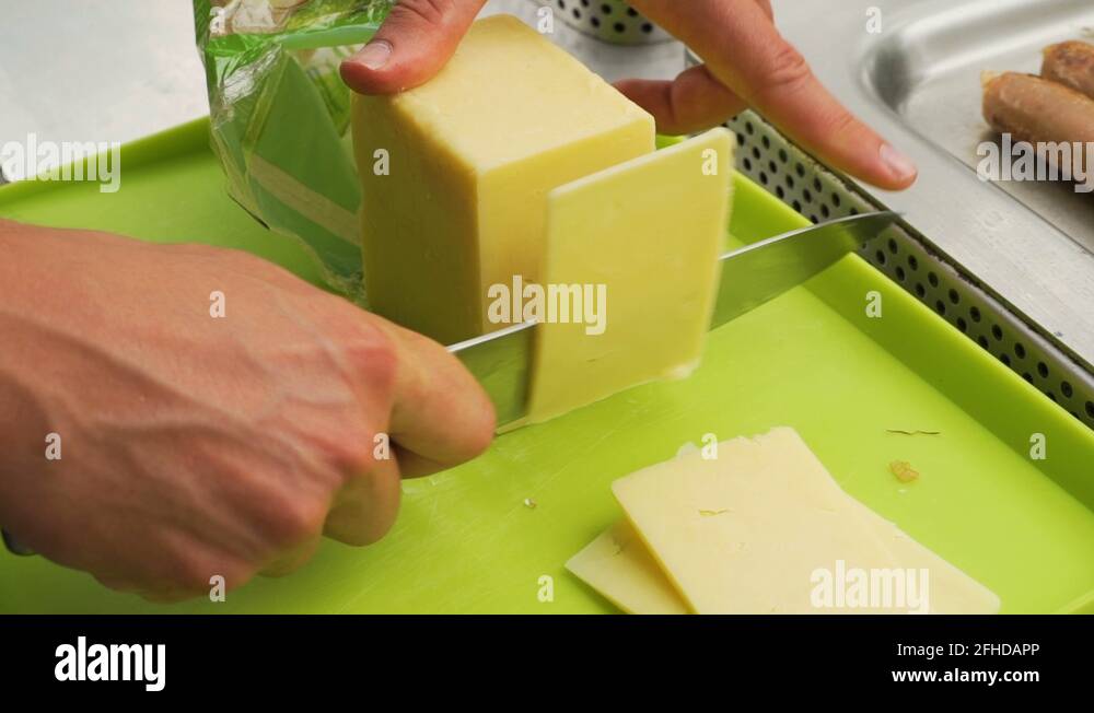Cheddar knife Stock Videos & Footage - HD and 4K Video Clips - Alamy