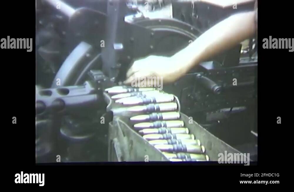 American soldiers loads ammunition in artillery and fires - 1969 - 1970 ...