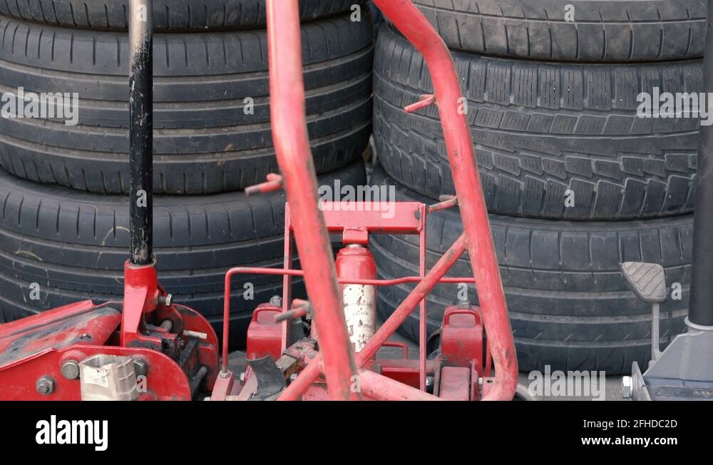 A stack of old tires on the tire shop. Close-up. Replacing the wheels ...
