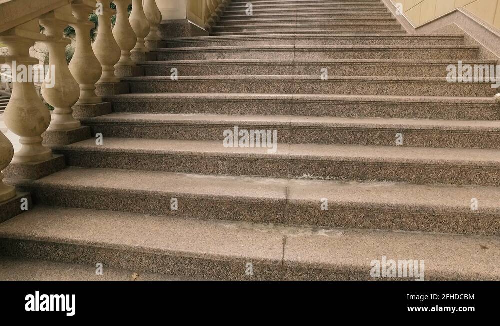 Element of architecture granite staircase with stone handrails. Steps ...