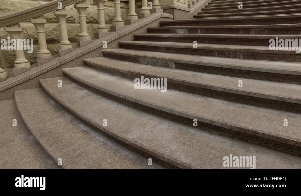 Element of architecture granite staircase with stone handrails. Steps ...