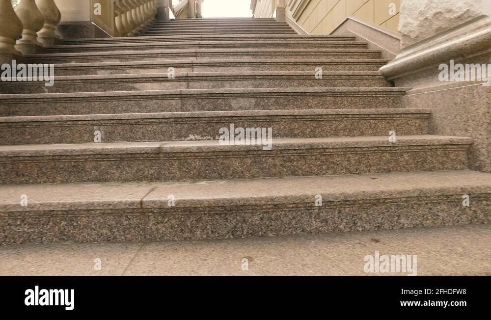 Element of architecture granite staircase with stone handrails. Steps ...