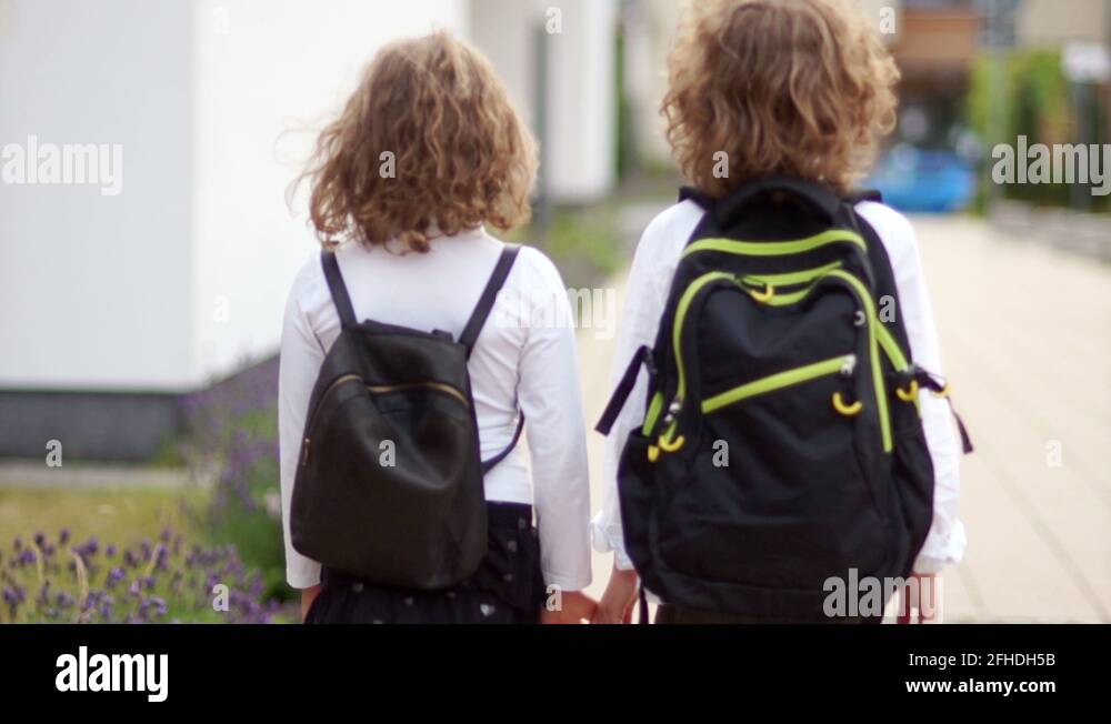 Classmates waving their hands at parting. Farewell school, last day of ...
