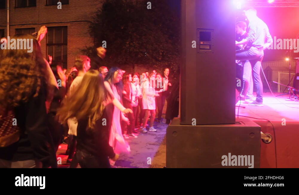 Young Students Jumping And Dancing Before Their Musical Idols Stock ...