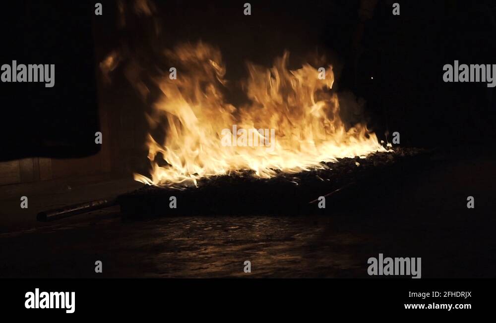 Man walking on fire Stock Videos & Footage - HD and 4K Video Clips - Alamy