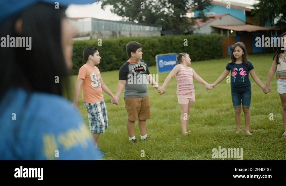 Kids playing circle, girl laughing Stock Video Footage - Alamy