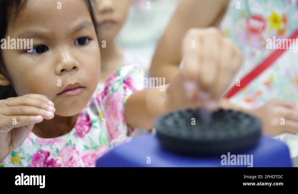 Little girl chemist doing Stock Videos & Footage - HD and 4K Video ...