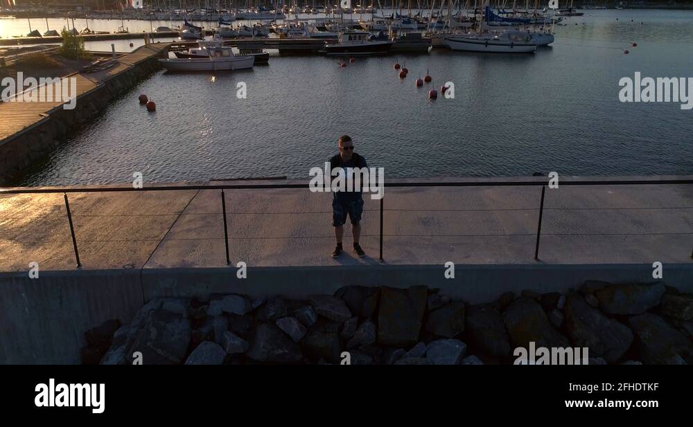 Man looking away at harbour Stock Videos & Footage - HD and 4K Video ...