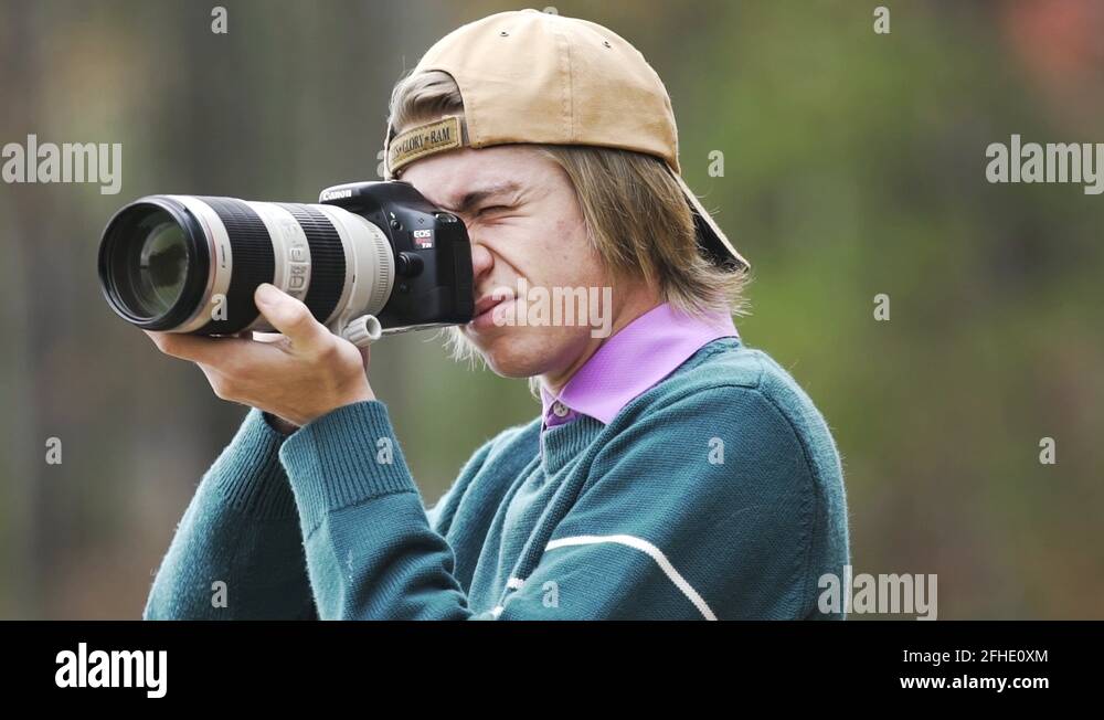 Photographer Looking Through Viewfinder 3 Stock Video Footage - Alamy