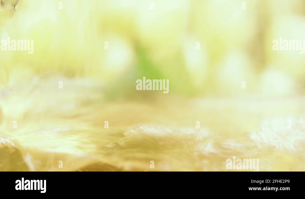 Yellow drink splash Stock Videos & Footage - HD and 4K Video Clips - Alamy