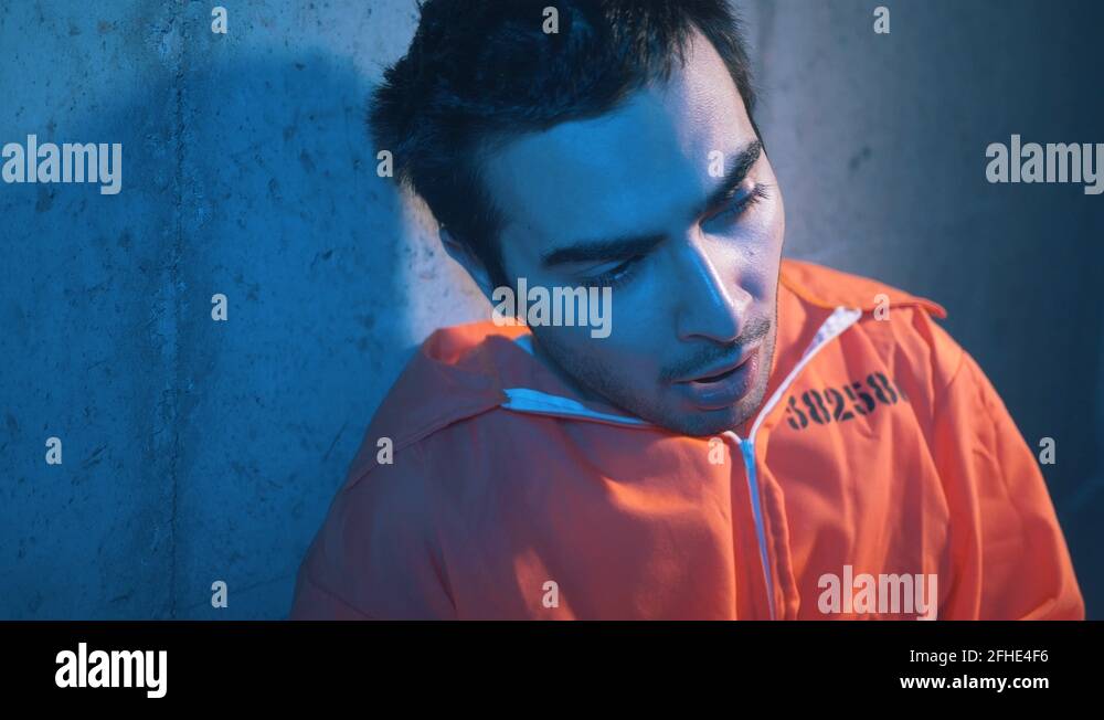 Tired Jail Inmate Falling Asleep In His Prison Cell Stock Video Footage ...