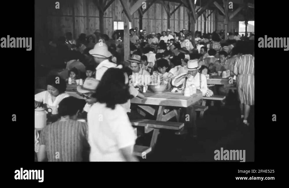 WW2 1942 USA - Japanese in relocation center during meal Stock Video ...