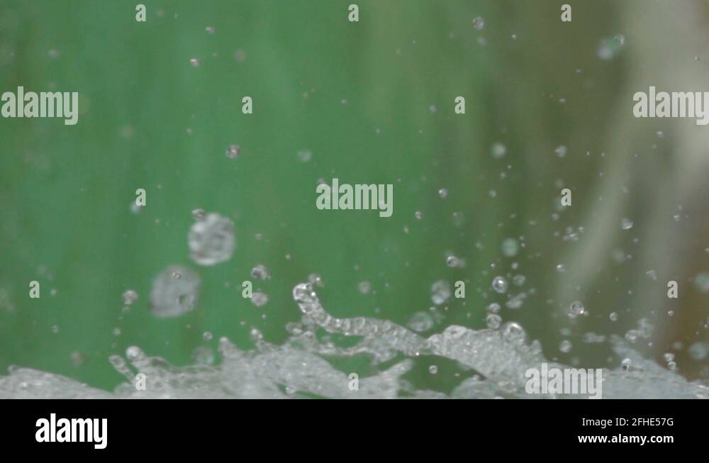 A horizontal whirlpool. Two streams of water to meet each other. Flying ...