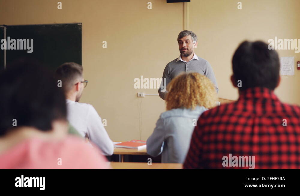 Friendly teacher Stock Videos & Footage - HD and 4K Video Clips - Alamy