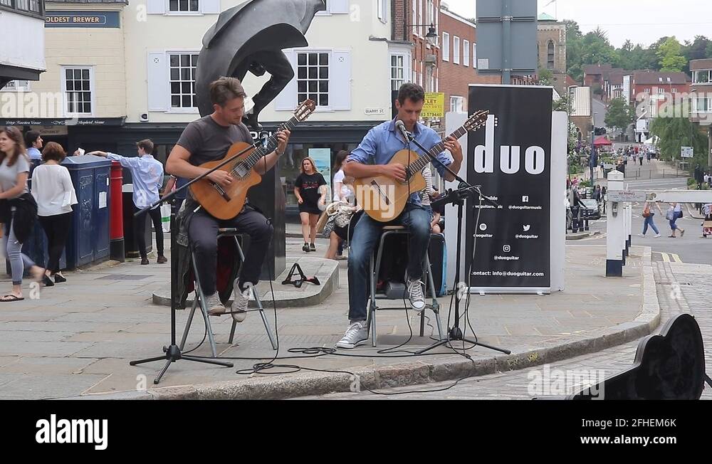Busking guitars Stock Videos & Footage - HD and 4K Video Clips - Alamy