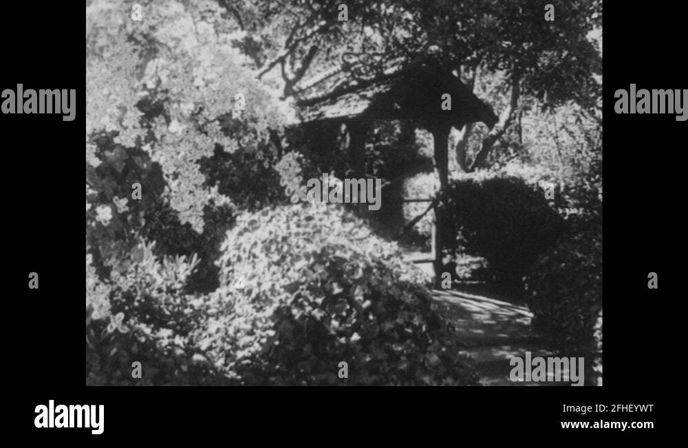 1950s: Garden path and gate. Exterior of house, sunroom Stock Video ...