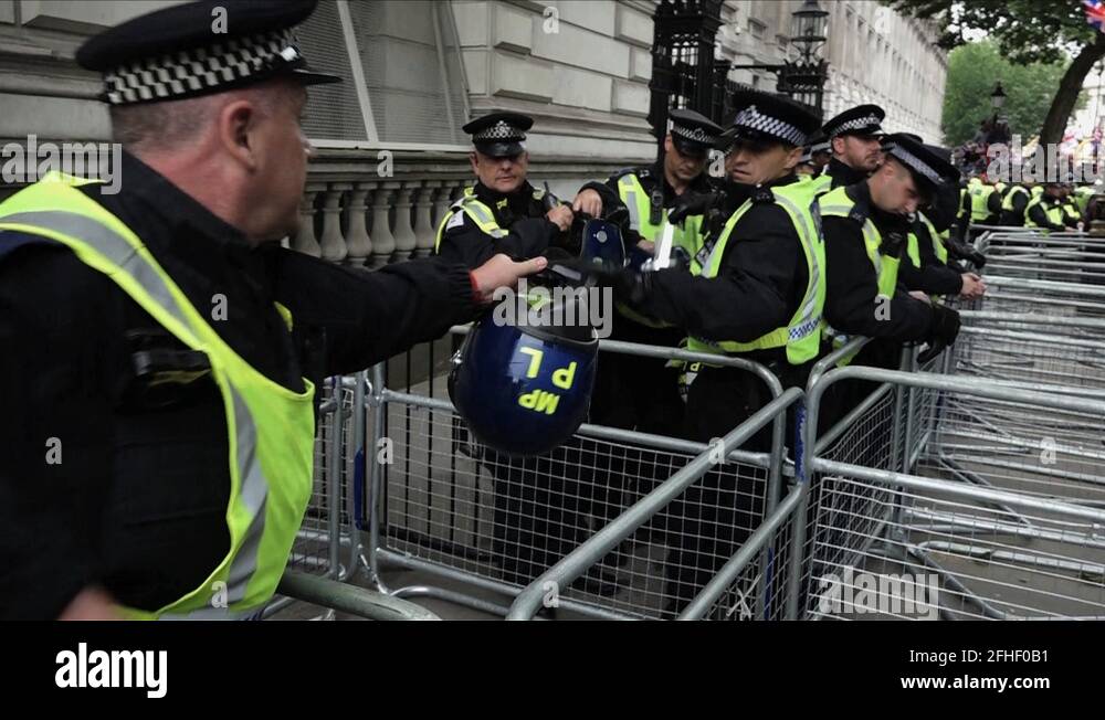 Police riot helmets london Stock Videos & Footage - HD and 4K Video ...