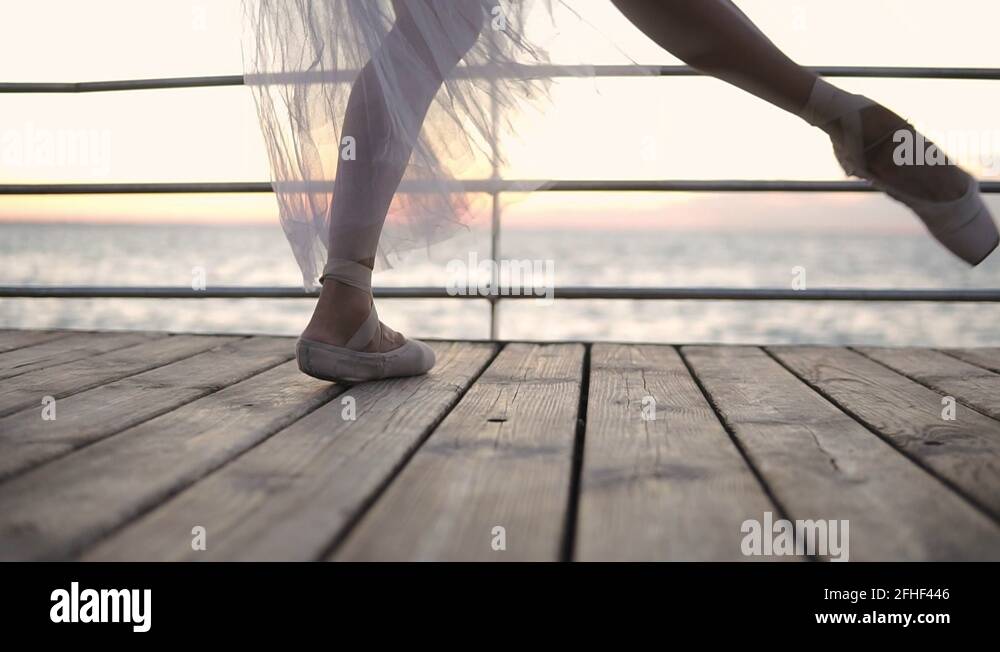 Close Up Of A Ballet Dancers Feet As She Practices Point Exercises