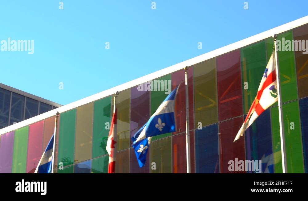 Flags waving at the Montreal Convention Center Stock Video Footage - Alamy