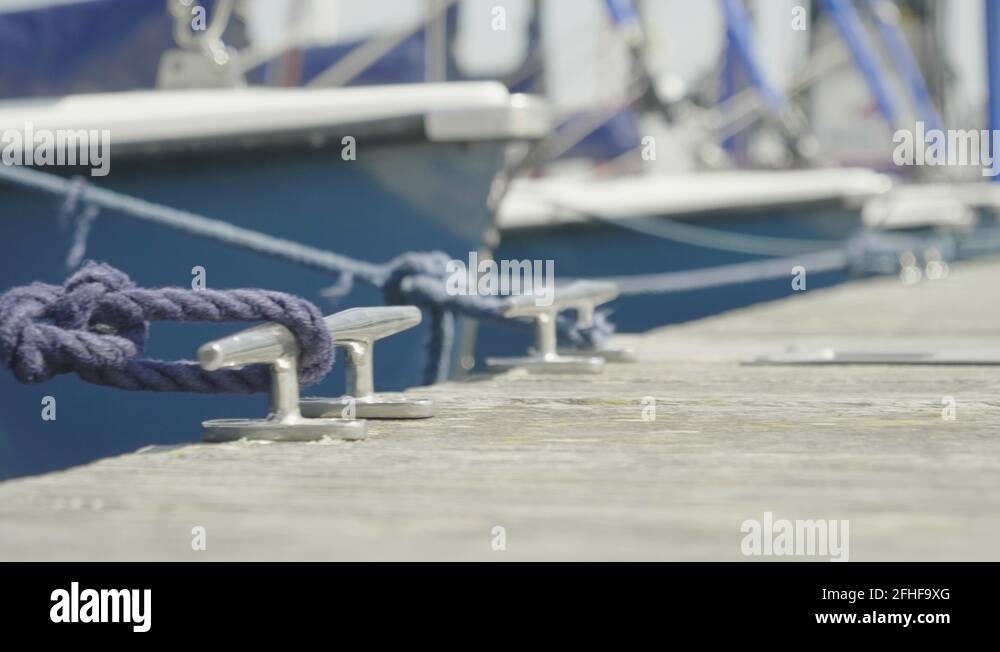 Boat attached to the dock with a rope, slide shot Stock Video Footage ...