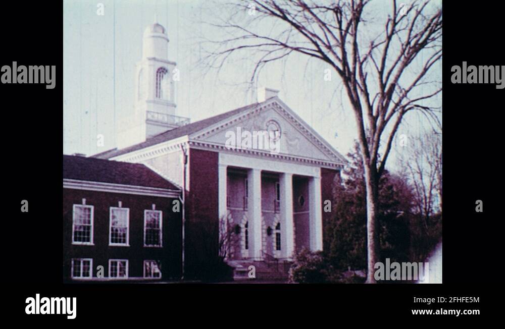 1960s: Government capitol building. Dome over building, trees. Exterior ...
