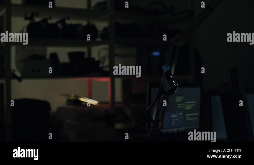 Hacker connecting with his computers in a dark basement Stock Video ...