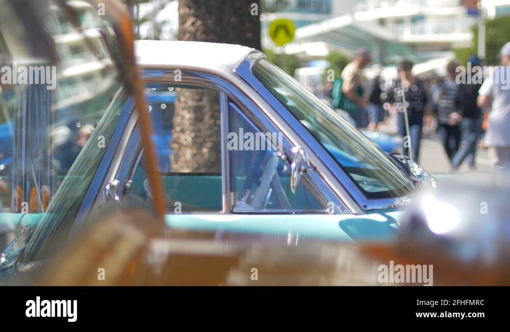 A slow motion tracking shot through the window of a vintage car. Shot ...