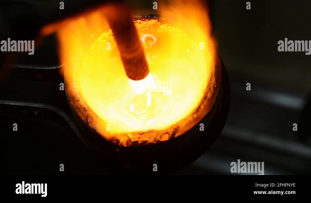 Pouring molten gold Stock Videos & Footage - HD and 4K Video Clips - Alamy