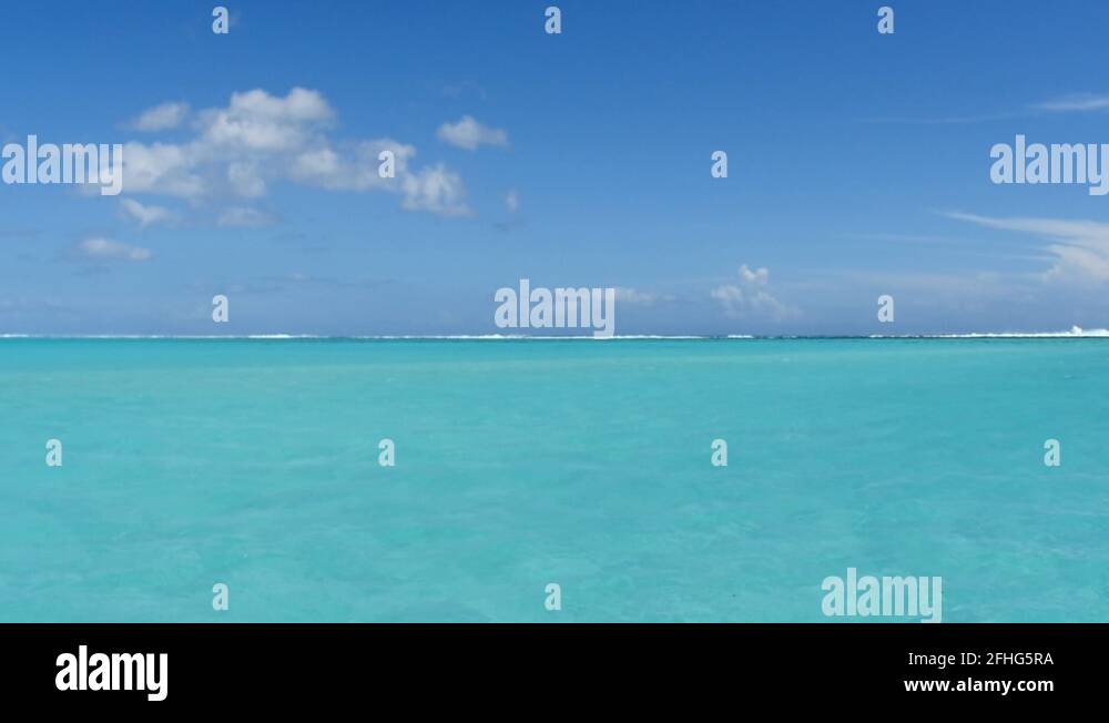 Blue lagoon view in French Polynesia from a boat. Sunny day crystal ...