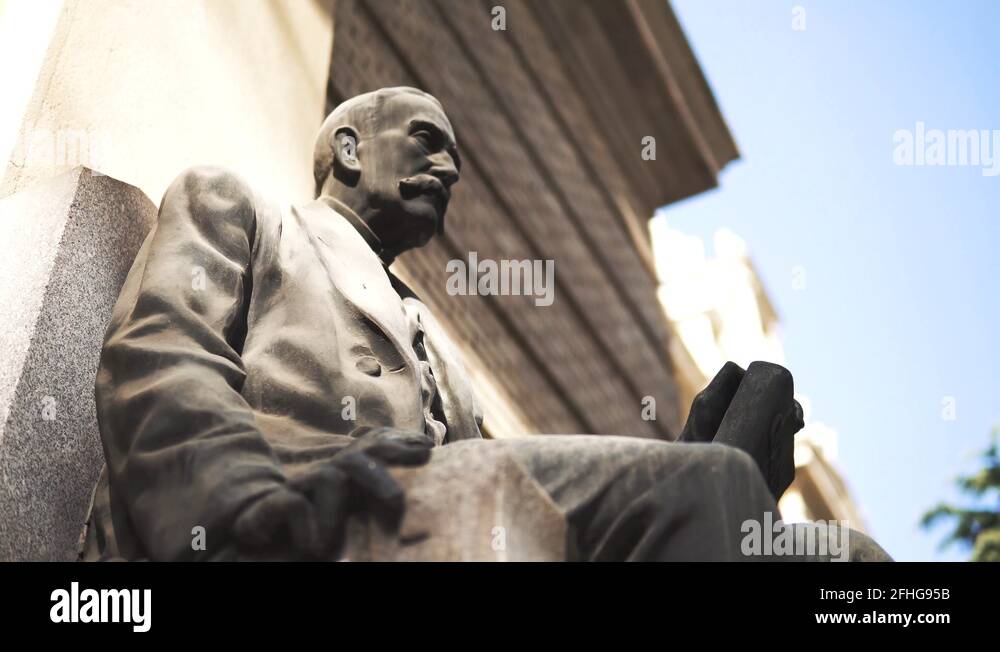 Statue of an old man before enter a building Stock Video Footage - Alamy