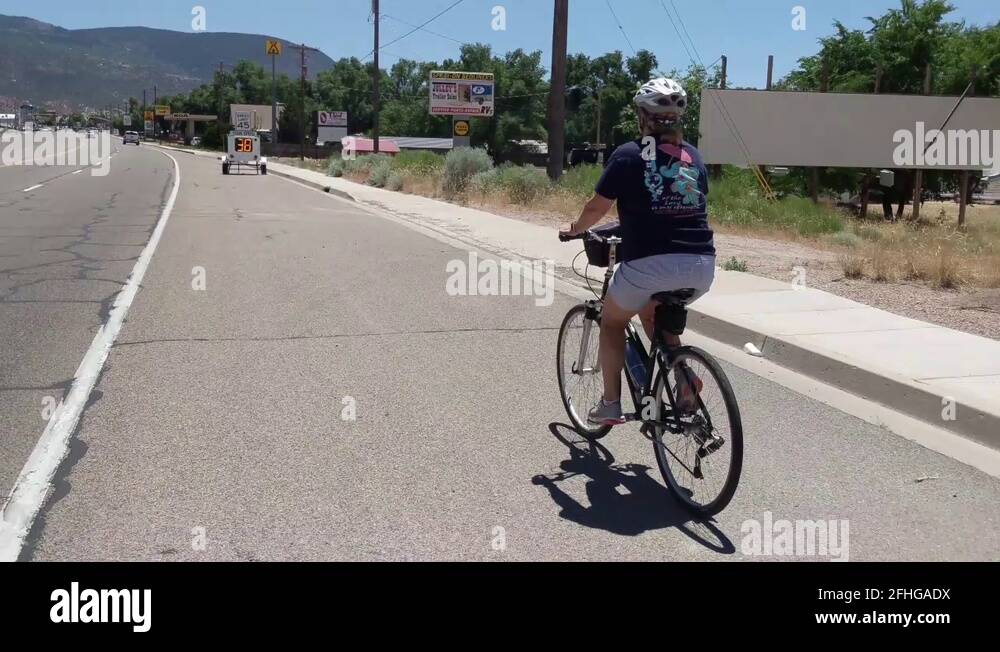 Lady riding her bicycle Stock Videos & Footage - HD and 4K Video Clips ...