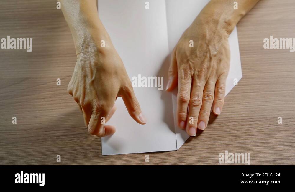 Hands folding paper airplane Stock Videos & Footage - HD and 4K Video ...