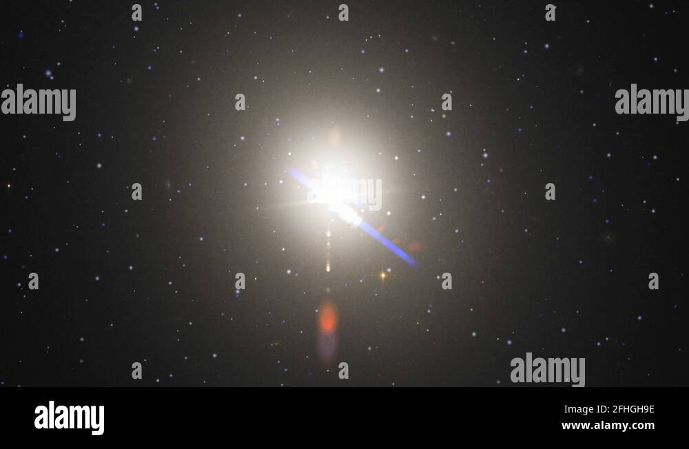 Rotating stars around elliptical galaxy in outer space animation Stock ...
