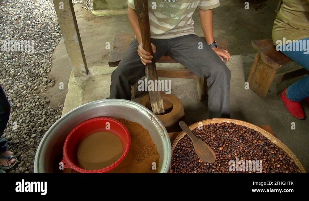 Traditional wooden pestle pounding rice Stock Videos & Footage - HD and ...