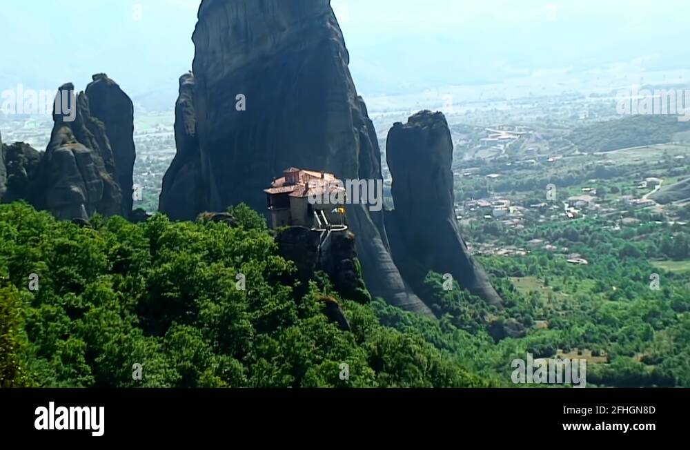 Zoom-Out Pan of Cliff Top Monasteries, Greece Stock Video Footage - Alamy