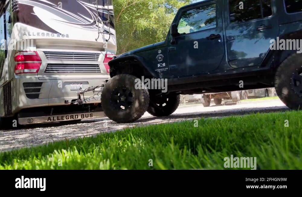 RV motorhome pulling into a campground Stock Video Footage - Alamy