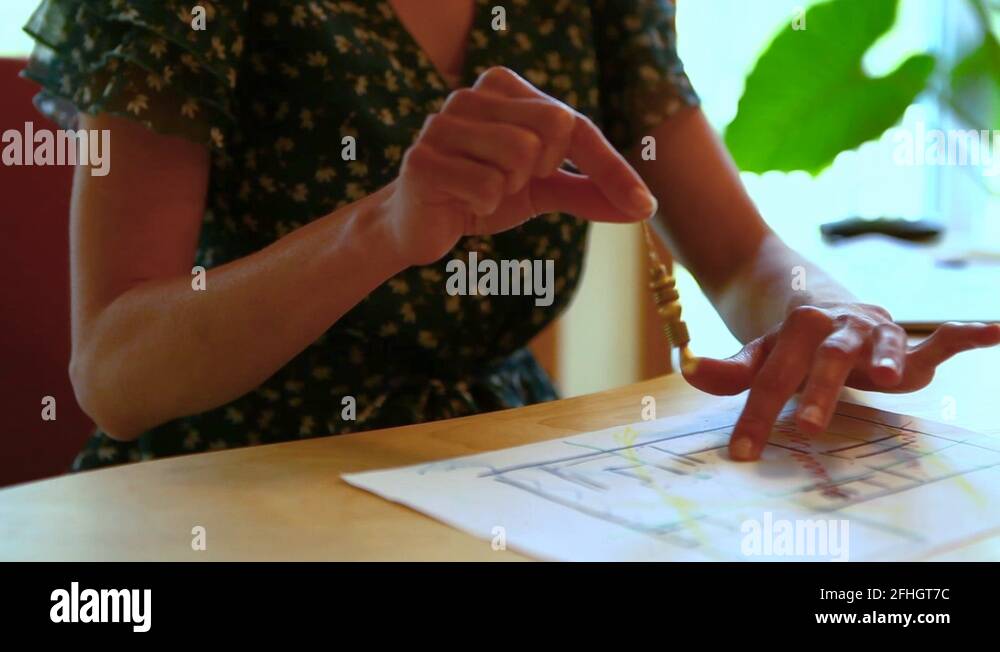 Pendulum dowsing woman Stock Videos & Footage - HD and 4K Video Clips ...