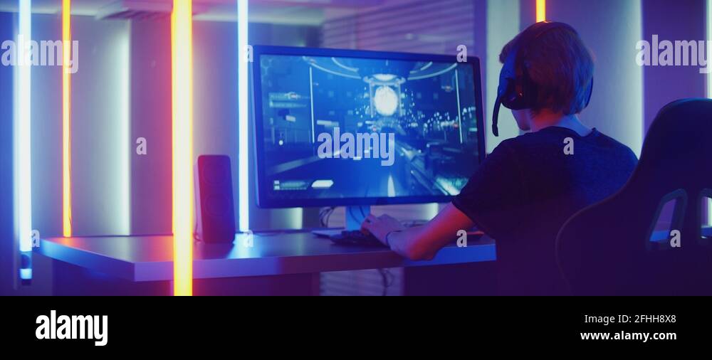 Pro Gamer Plays in Videogames on PC Anamorphic Lens Stock Video Footage ...