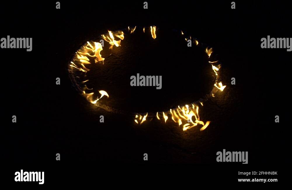 A circle of fire dying out in slow motion for use with visual effects ...