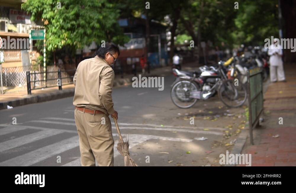 Indian street cleaner Stock Videos & Footage - HD and 4K Video Clips ...