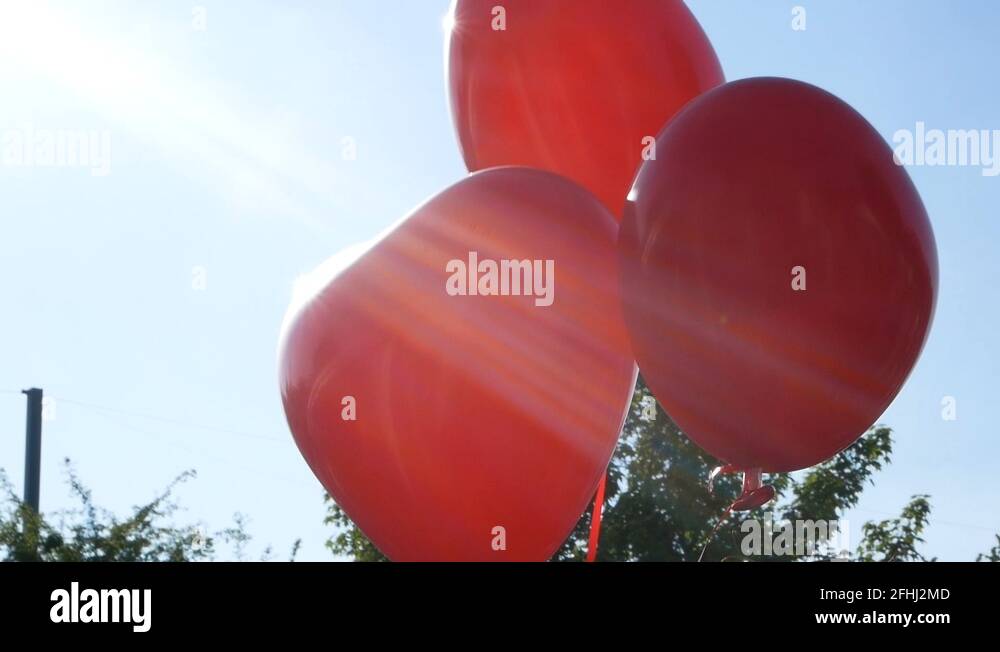 Red balloons pop Stock Videos & Footage - HD and 4K Video Clips - Alamy