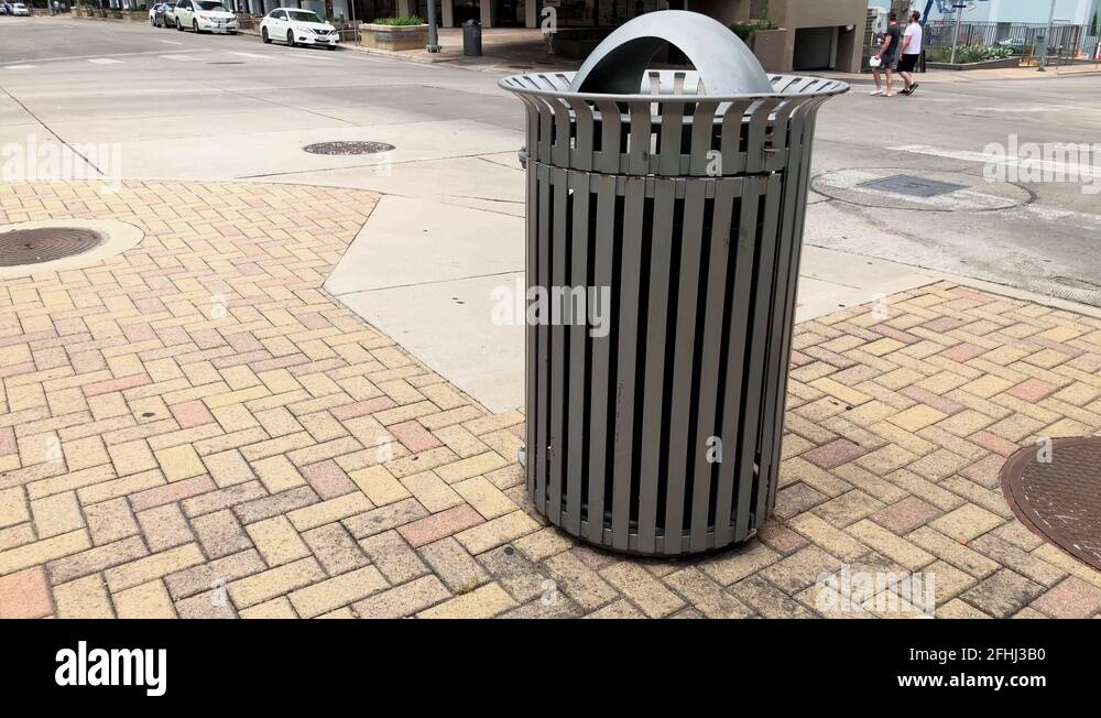 Sidewalk trash bin Stock Videos & Footage - HD and 4K Video Clips - Alamy