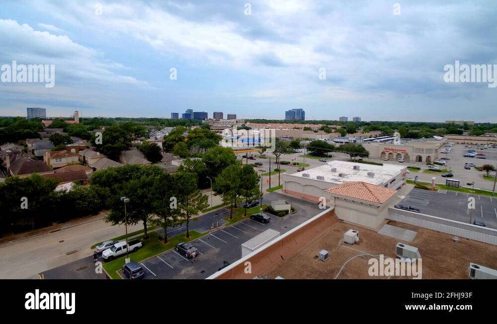 Houston Texas suburban street in 4K with cars driving around as dark ...