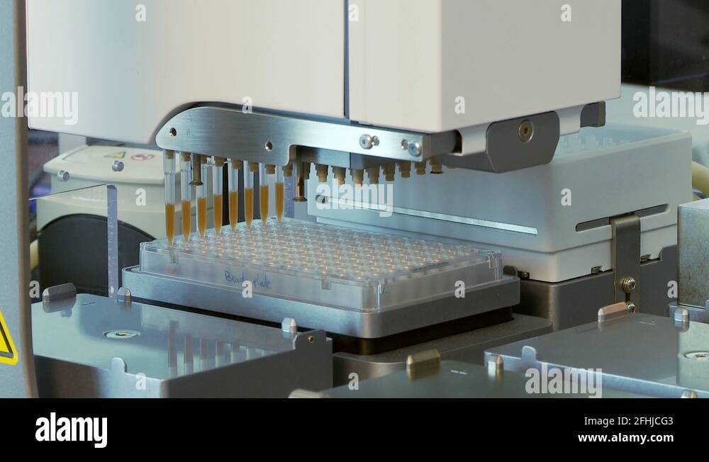 automated liquid handling system pipetting plate close up Stock Video ...