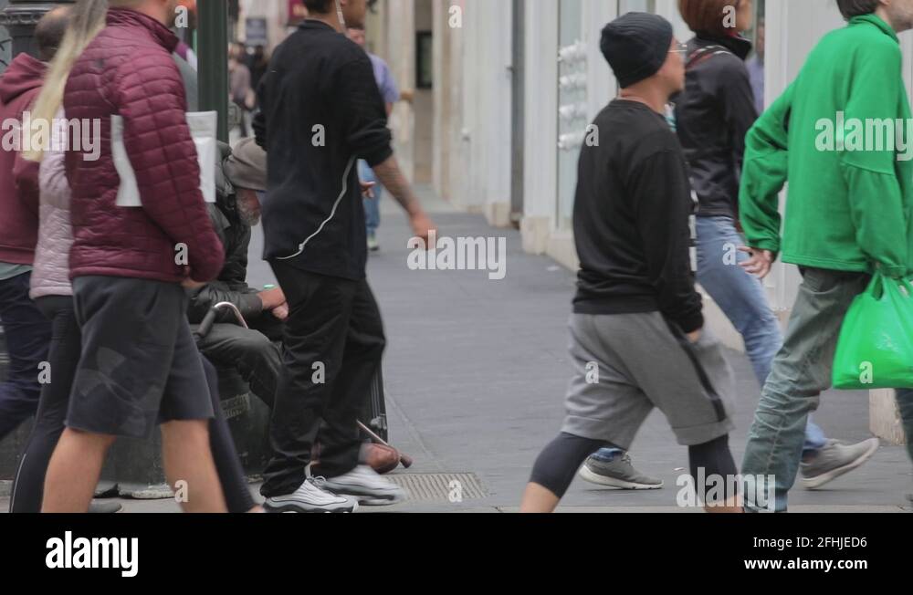 People walk past homeless people Stock Videos & Footage - HD and 4K ...