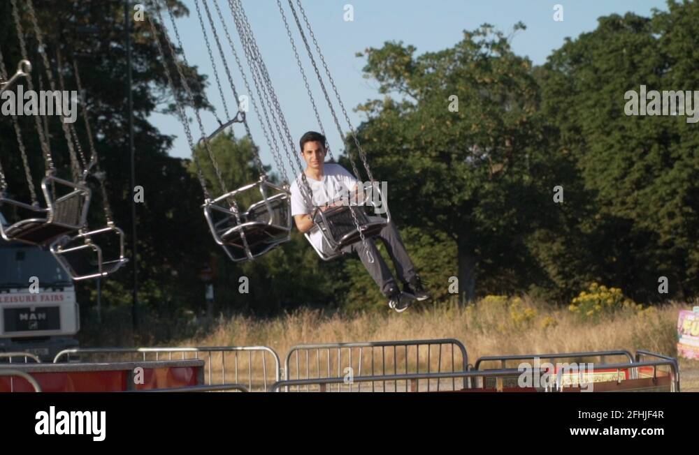 Fairground uk fair swings Stock Videos & Footage - HD and 4K Video ...